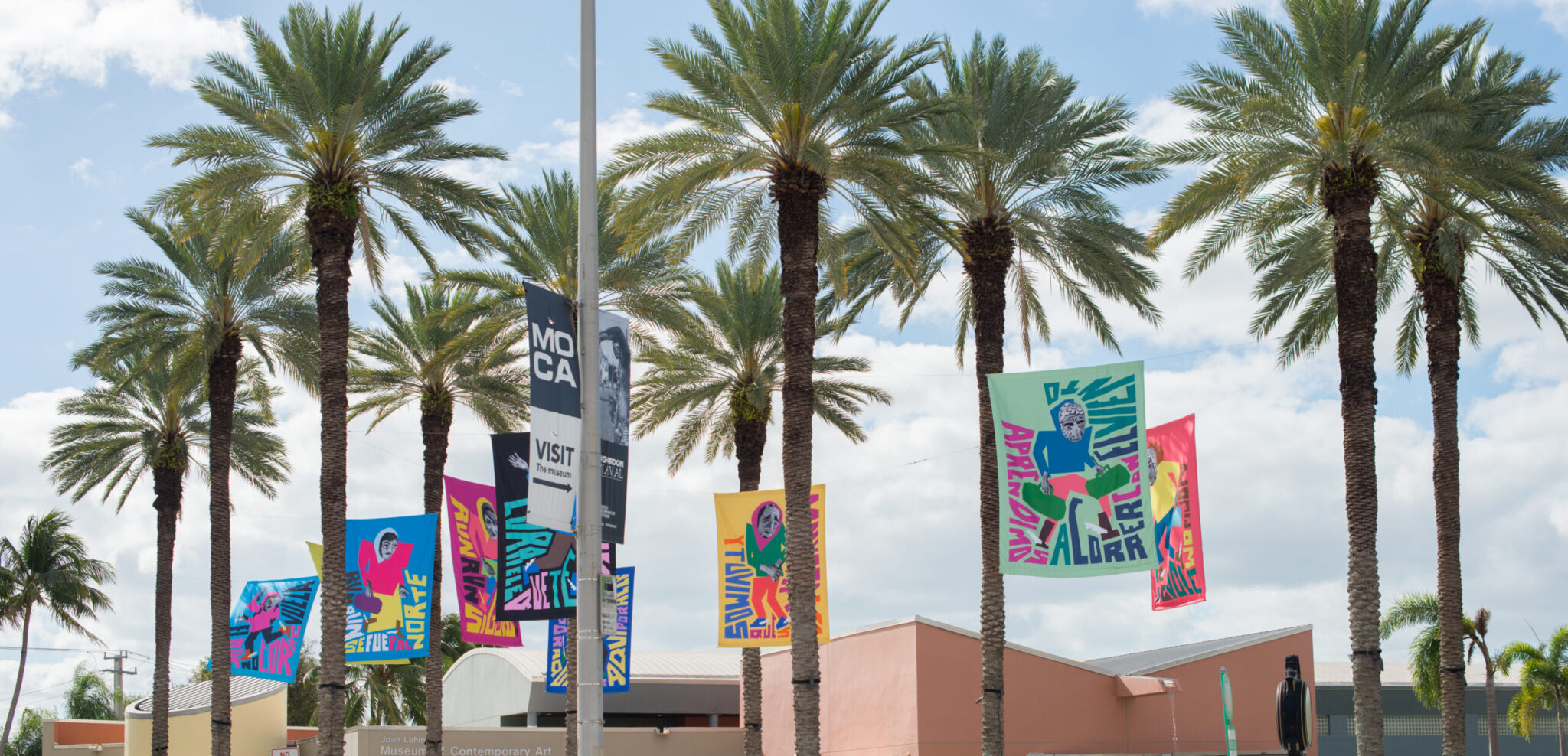 Flags with a message kick off another round of MOCA's Art on the Plaza ...